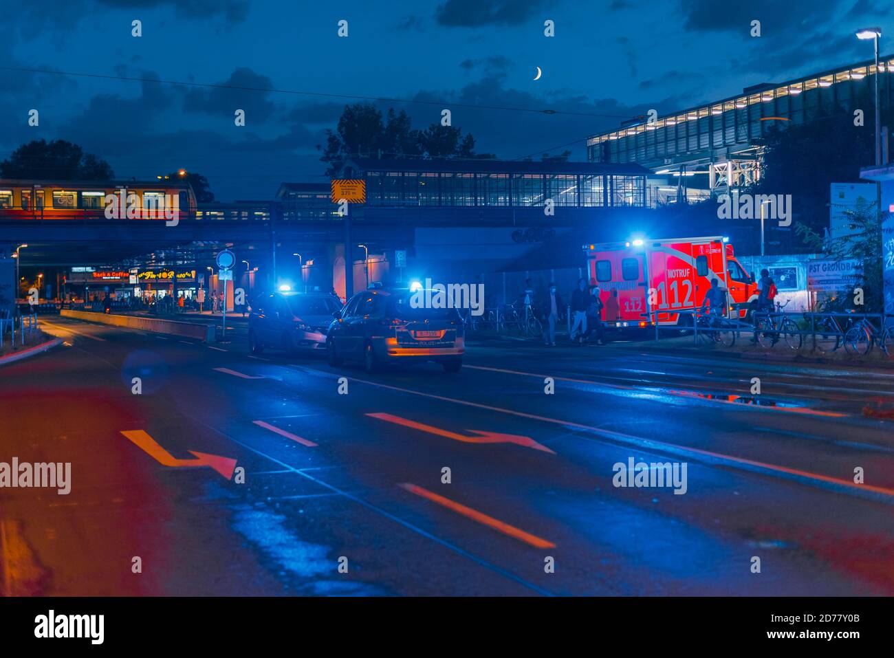 Emergency operations with ambulances and police vehicles at a train ...