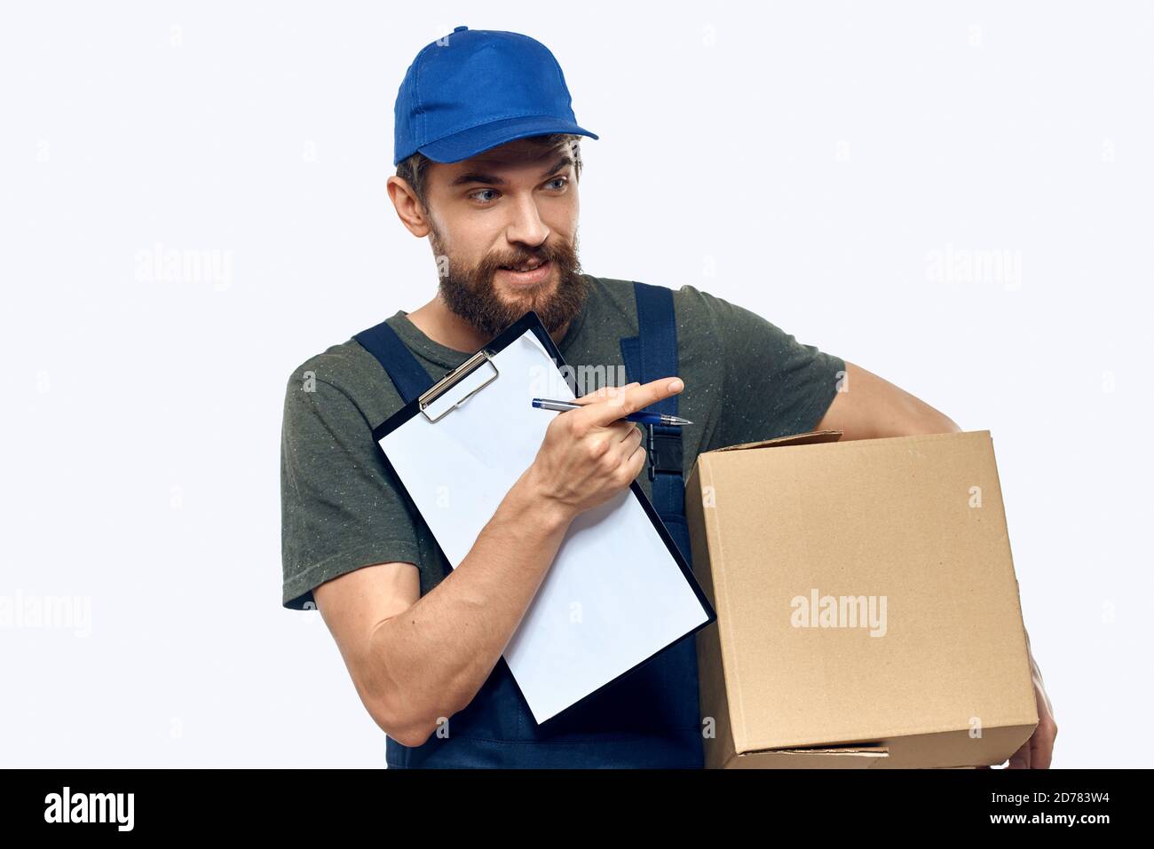 Working male courier with box in hand documents delivery service light ...