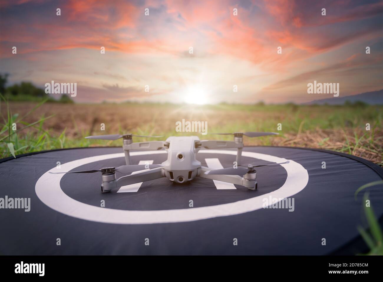 Starting point at pilot started on a drone flight in field Stock Photo ...