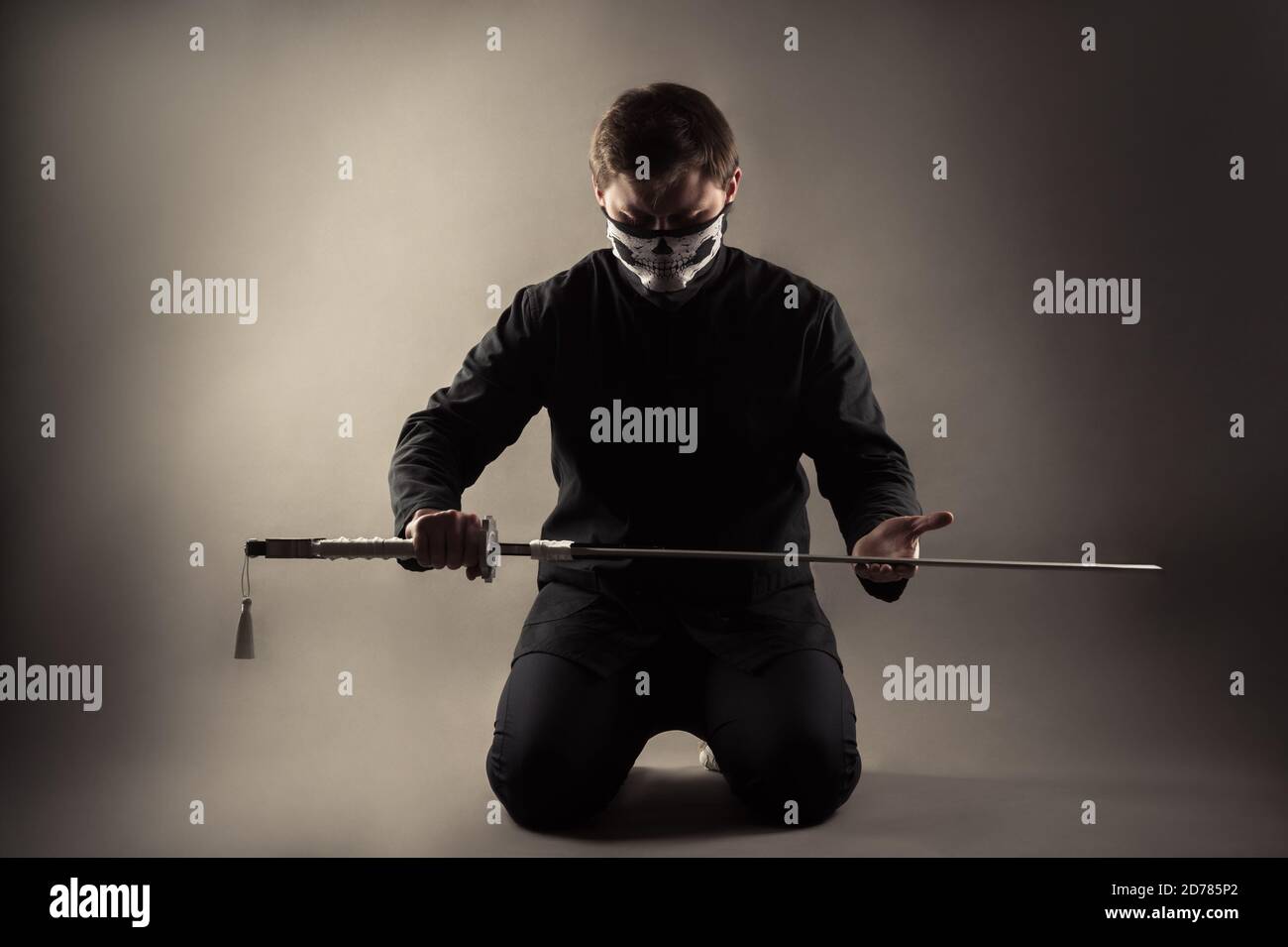 Young Man Holding Samurai Sword High Resolution Stock Photography and ...