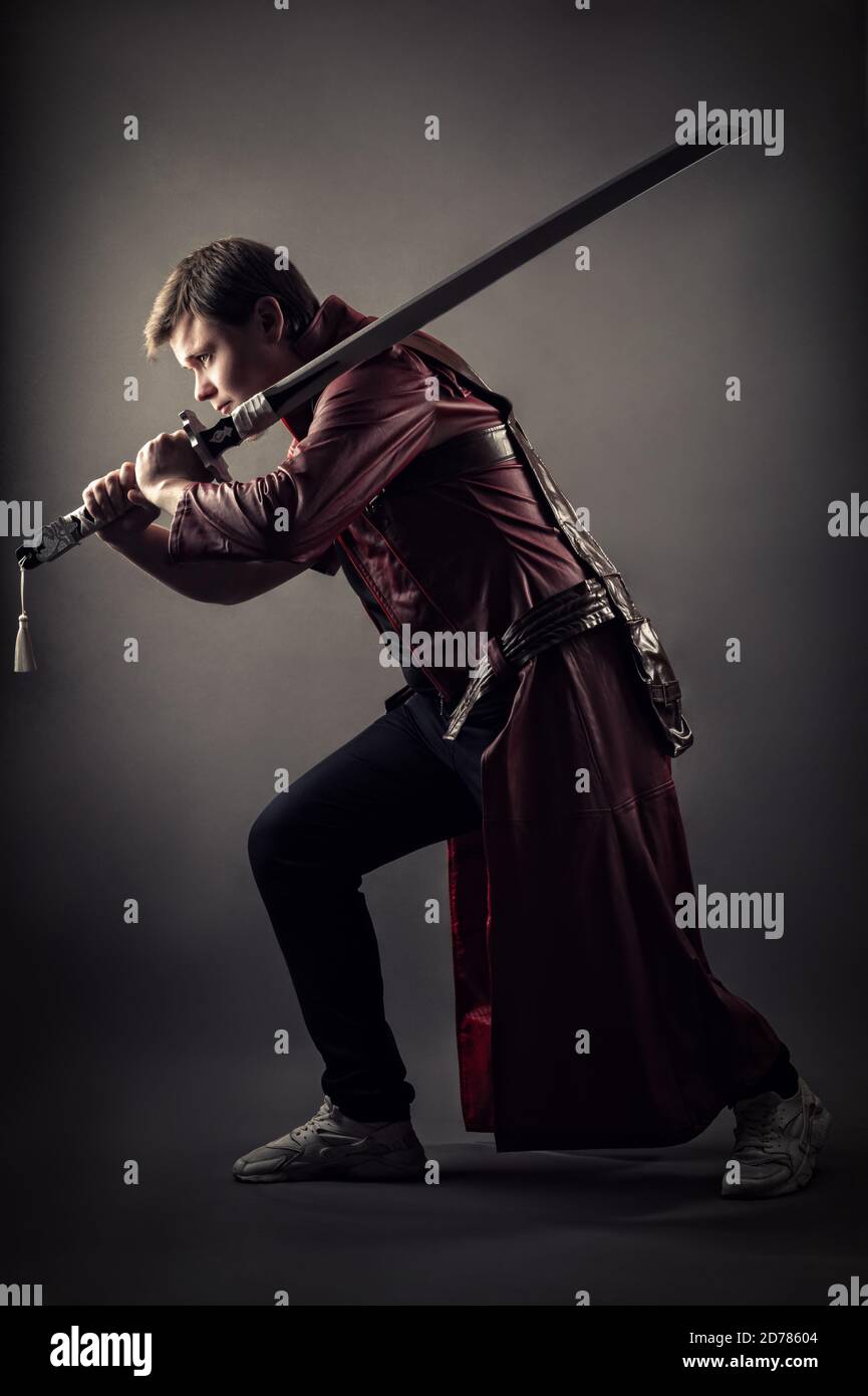 brutal samurai with sword in hands Stock Photo - Alamy