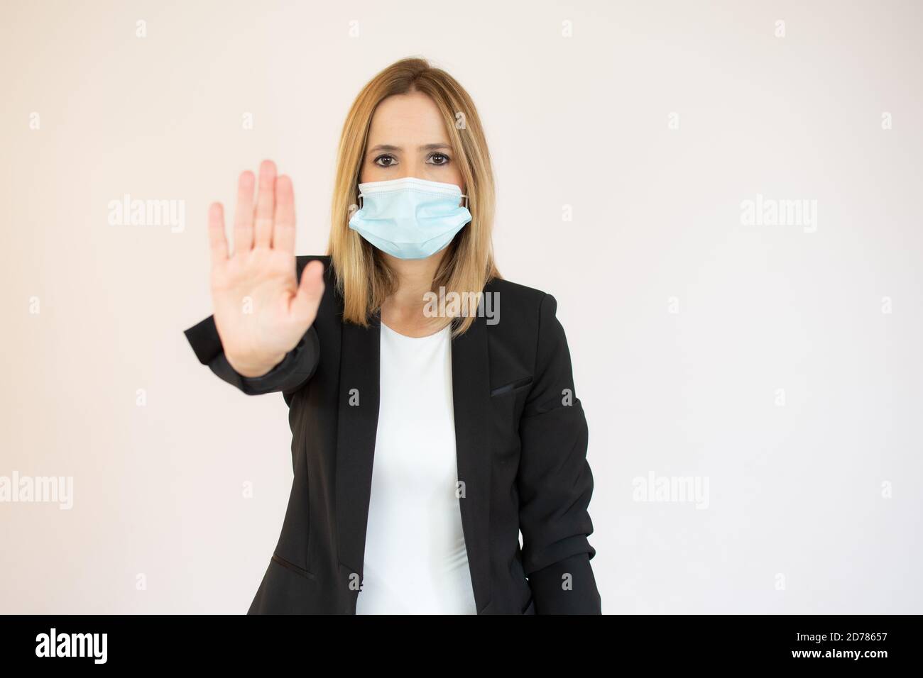 Young businesswoman making a rejection pose on a white background Stock ...