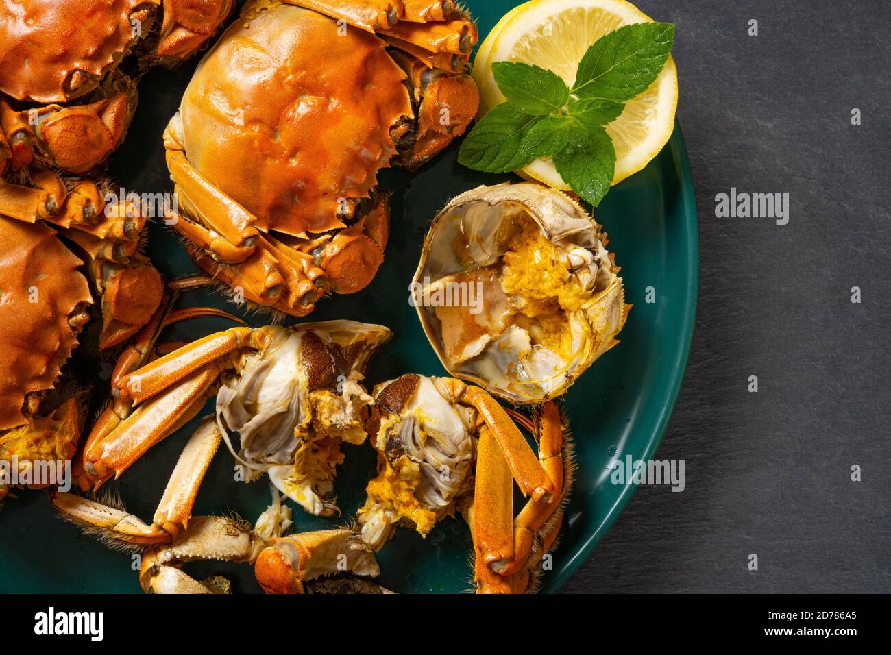 top view crabs with one opened showing the crab roe and meat horizontal ...