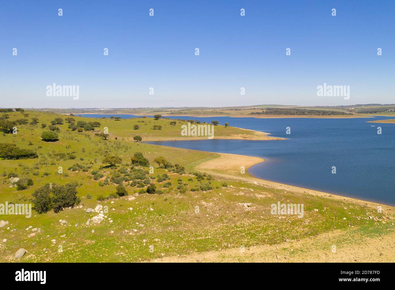 Dam lake reservoir drone aerial view of Barragem do Caia Dam olive ...