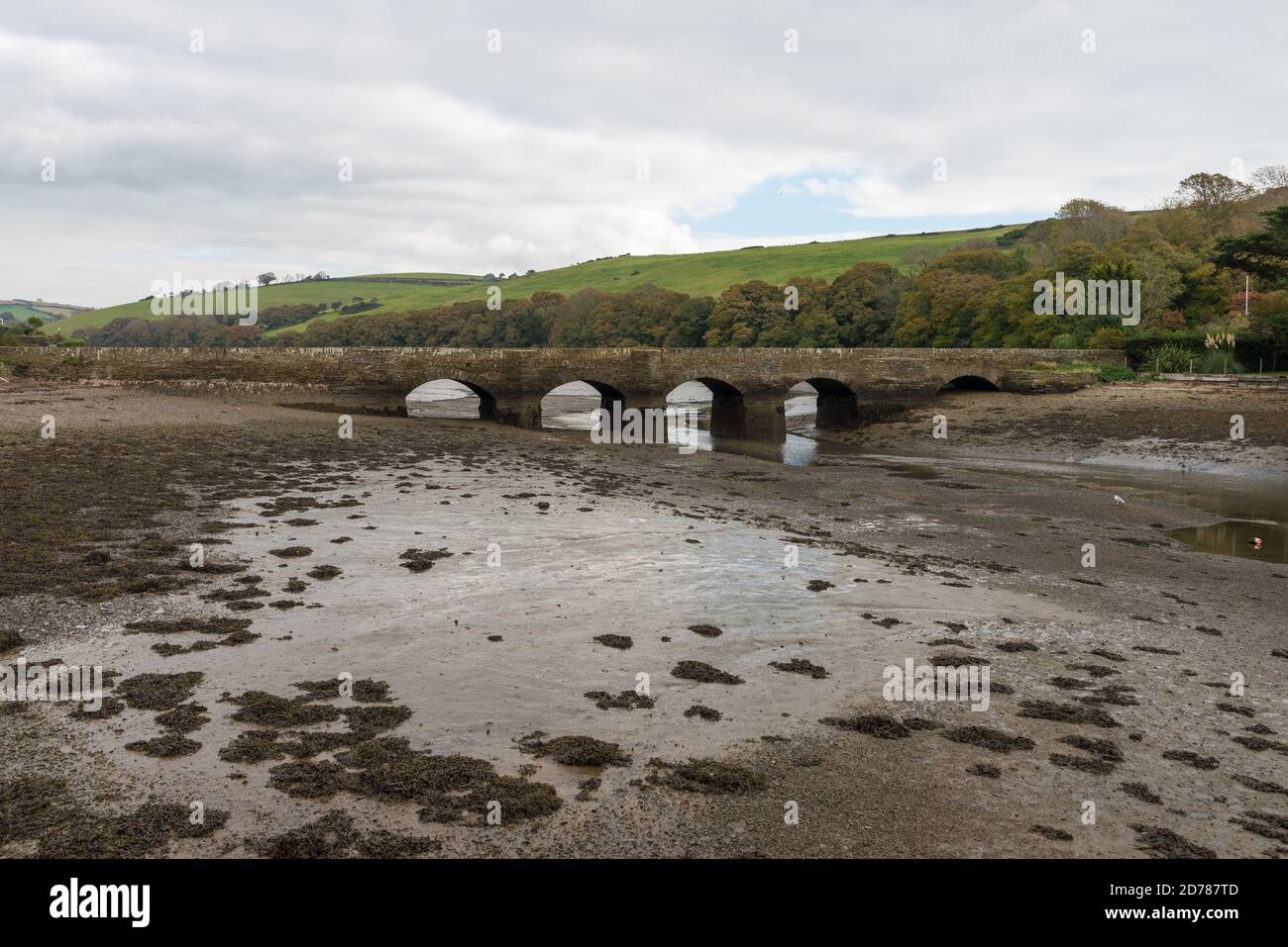 The old stone bridge crossing the Kingsbridge estuary at Bowcombe Creek ...