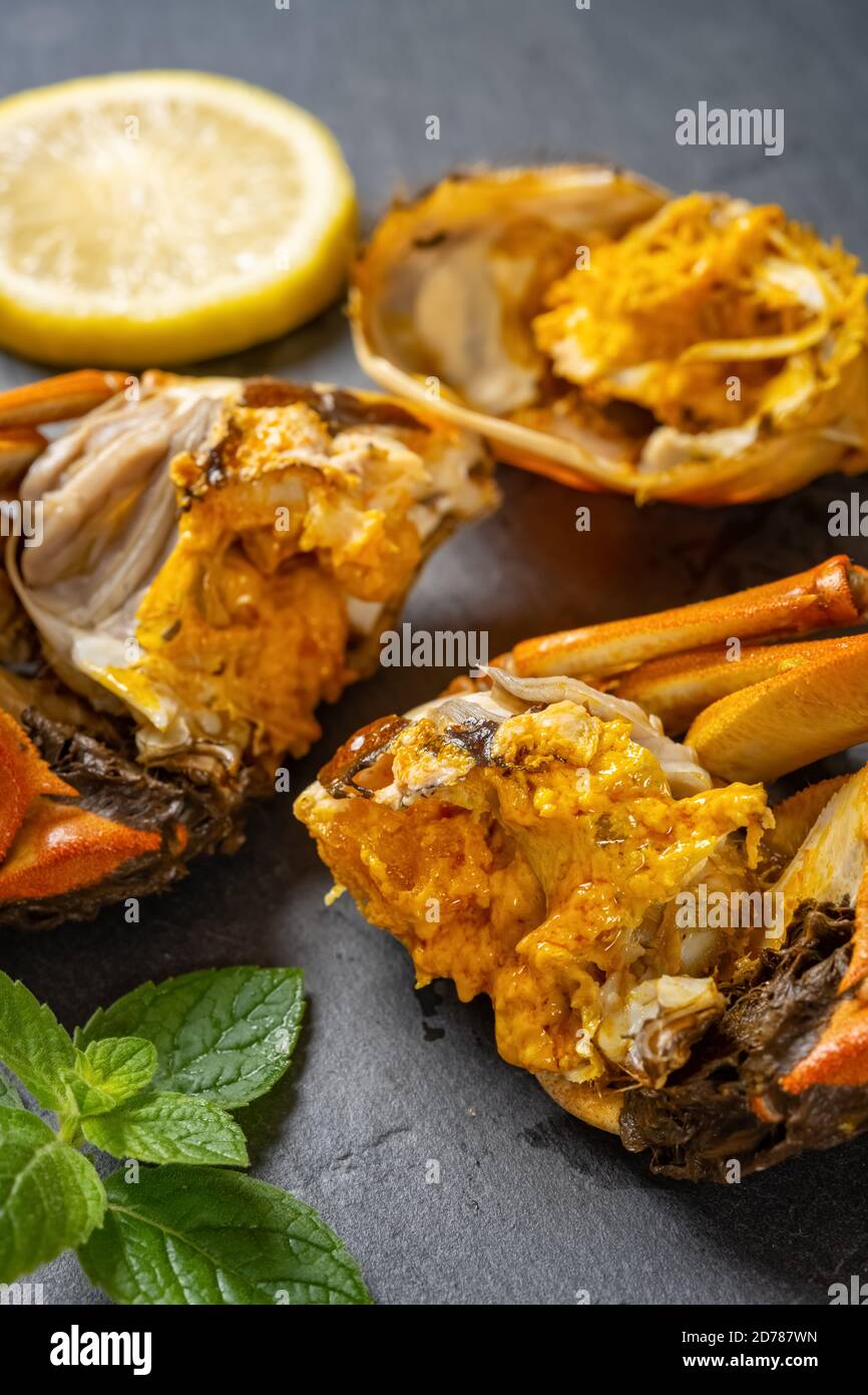 opened crab showing the crab roe and meat vertical composition Stock ...