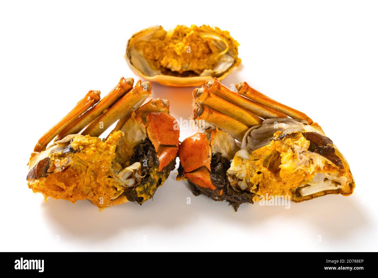 side view cooked crab with the lid opened on a white background Stock ...