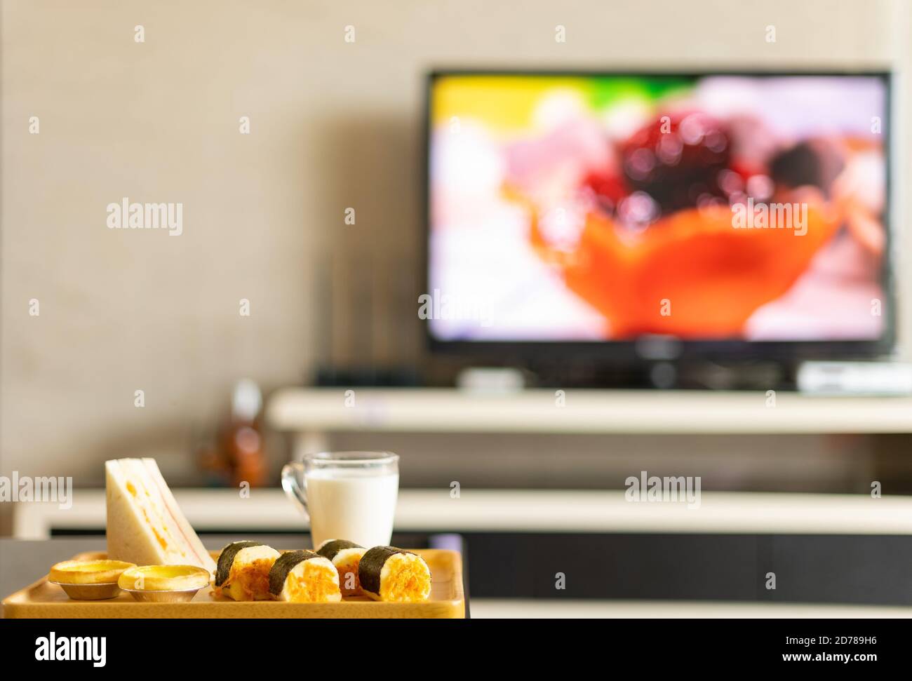 healthy breakfast in a living room with a TV broadcasting a food ...