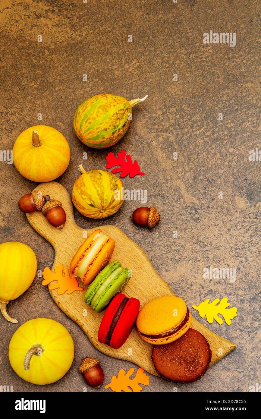 French macarons in autumn colors. Halloween dessert, Thanksgiving menu ...