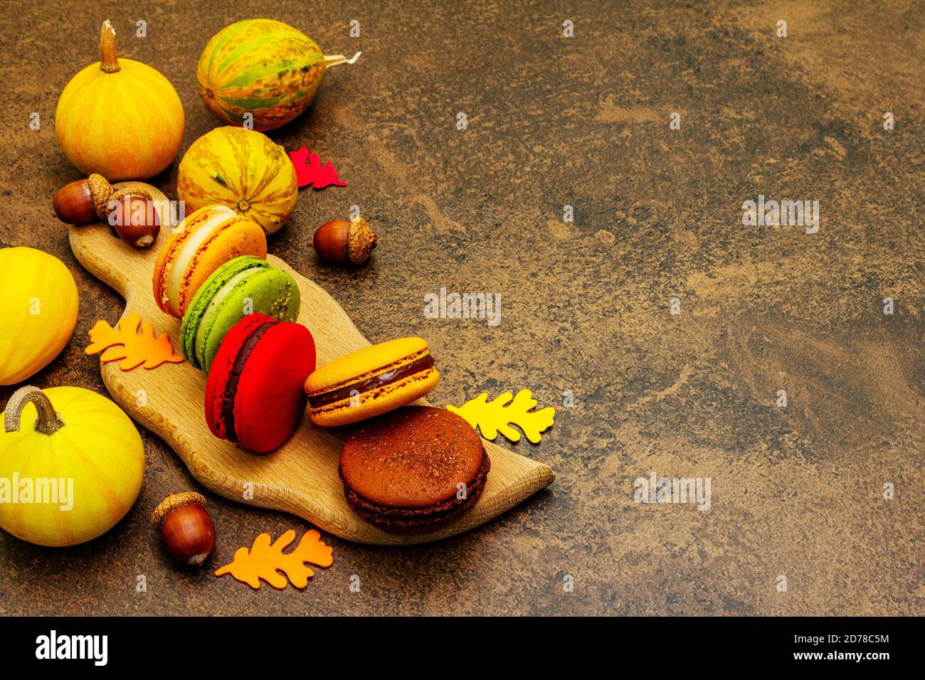 French macarons in autumn colors. Halloween dessert, Thanksgiving menu ...
