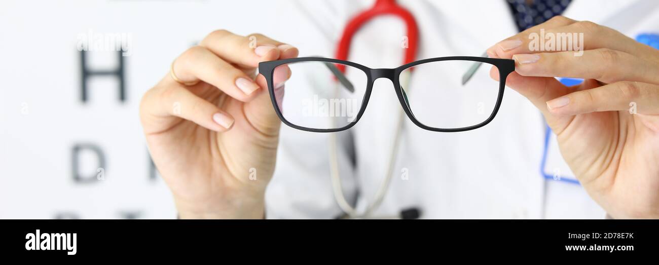 Doctor wearing red stethoscope Stock Photo - Alamy