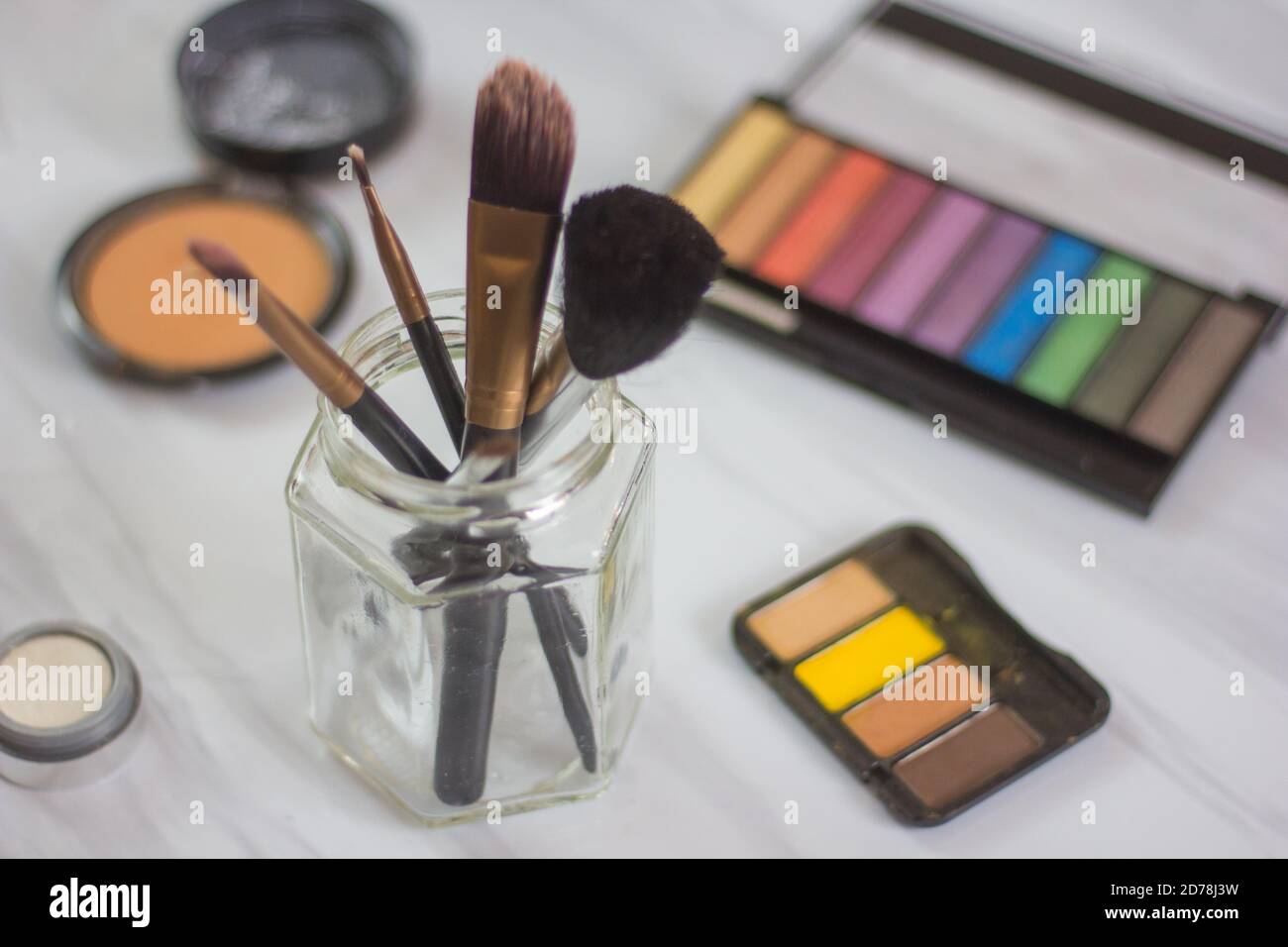 Make up elements on a table Stock Photo - Alamy