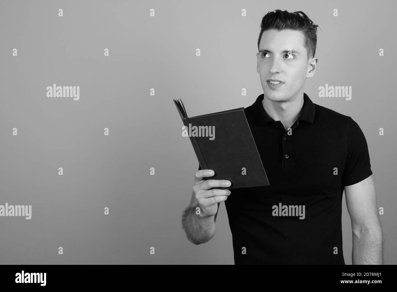 Adult male reading book hi-res stock photography and images - Alamy