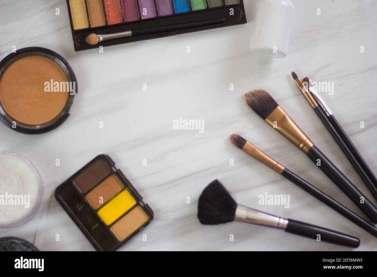 Make up elements on a table Stock Photo - Alamy