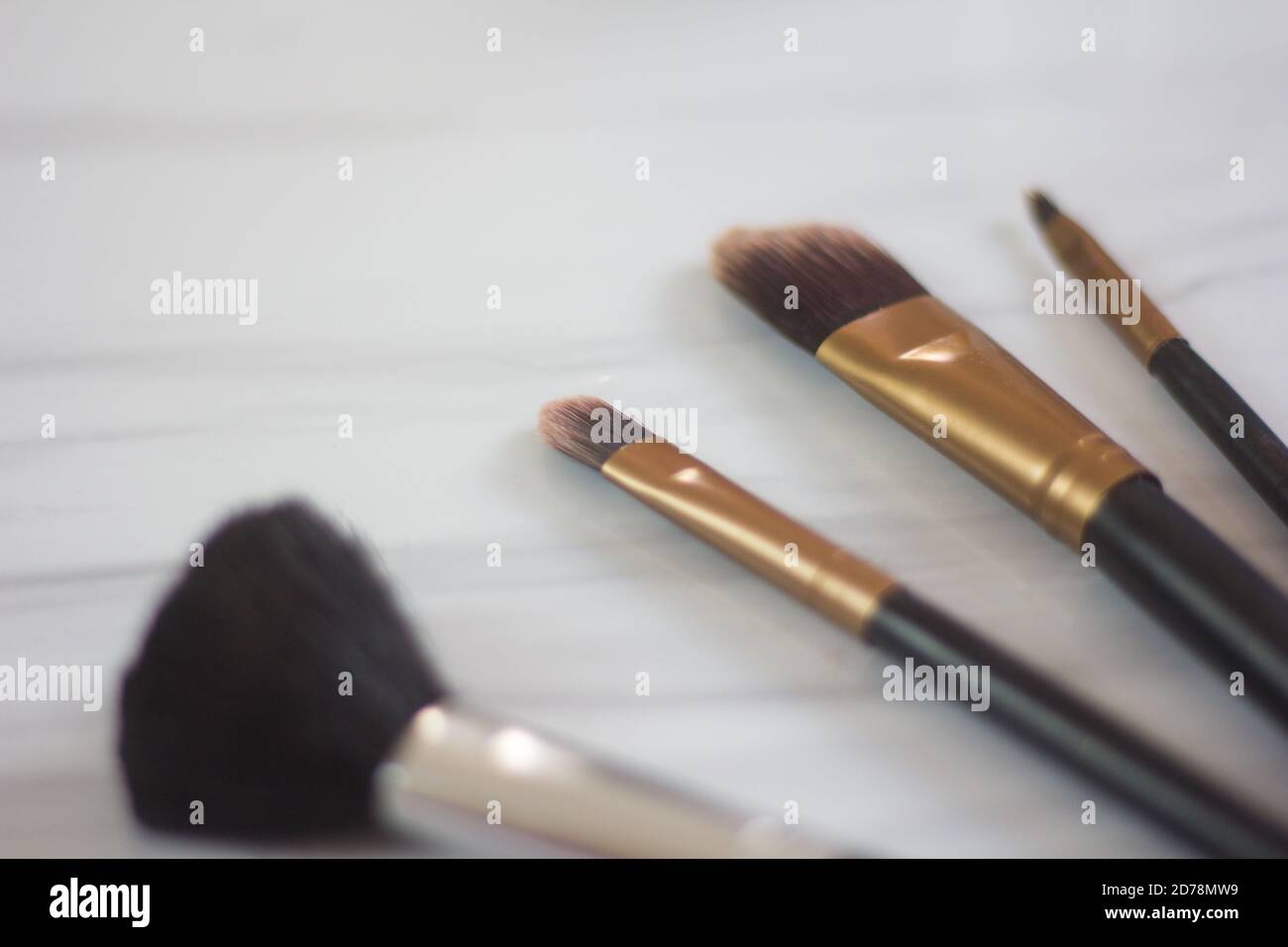 Make up elements on a table Stock Photo - Alamy