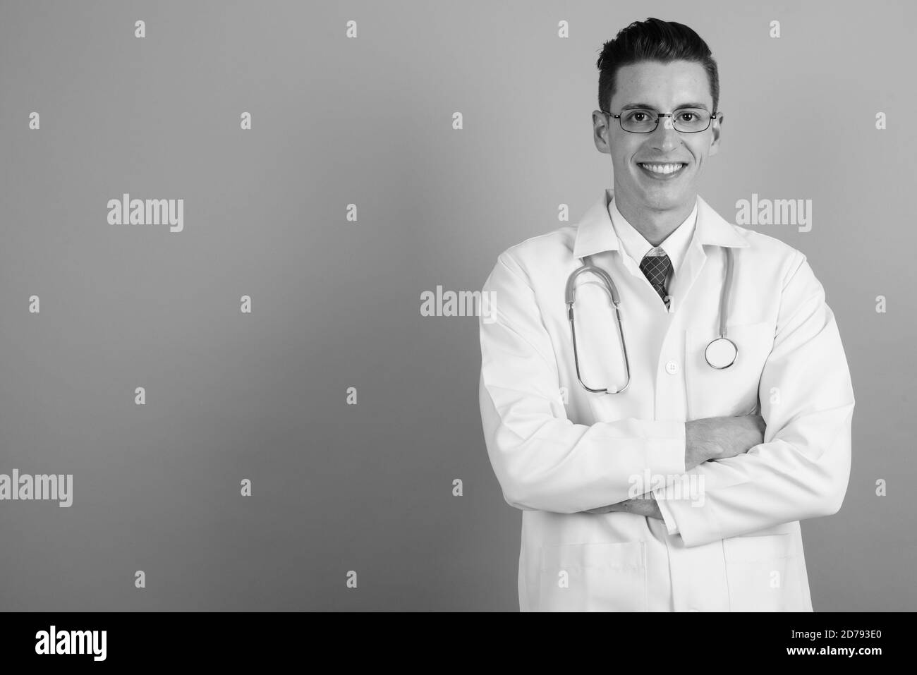 Happy confident doctor man Black and White Stock Photos & Images - Alamy