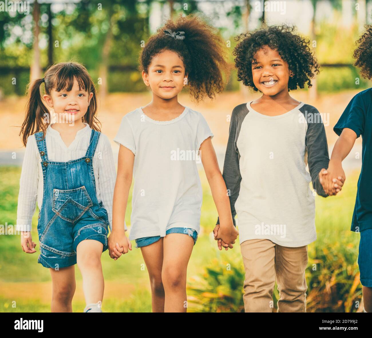 African american kids walking to school hi-res stock photography and ...
