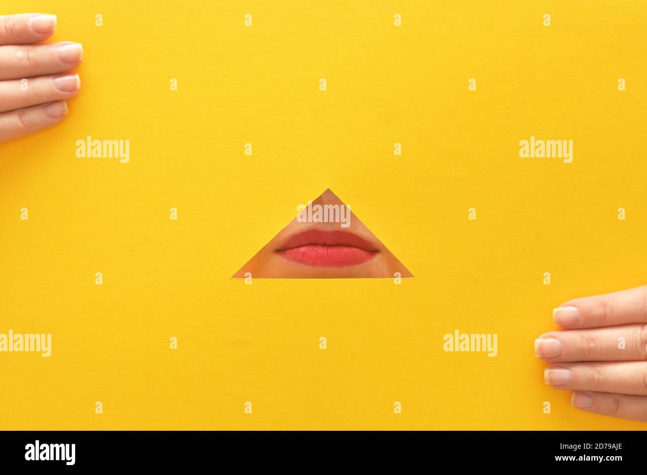 Conceptual Lips, Body Part In A Triangle Stock Photo - Alamy