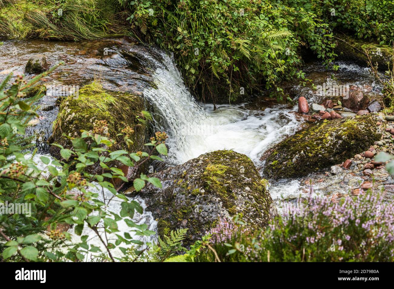 Stream flowing through mountains hi-res stock photography and images ...