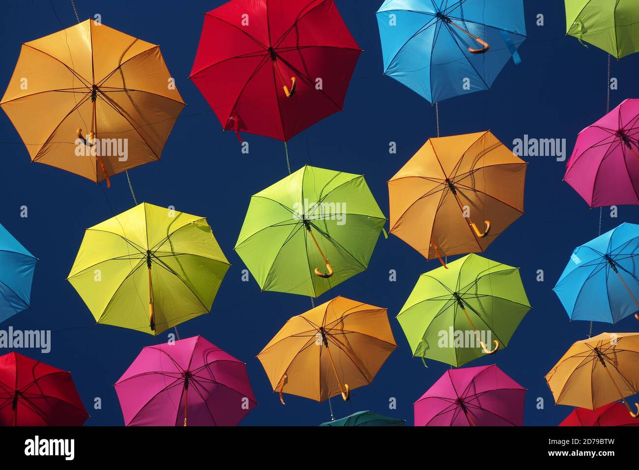 Colourful orange red blue umbrellas hi-res stock photography and images ...