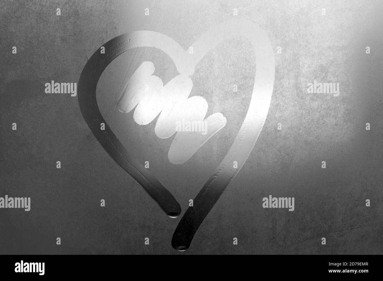 Inscription heart on the sweaty glass. heart drawn on a misted glass ...