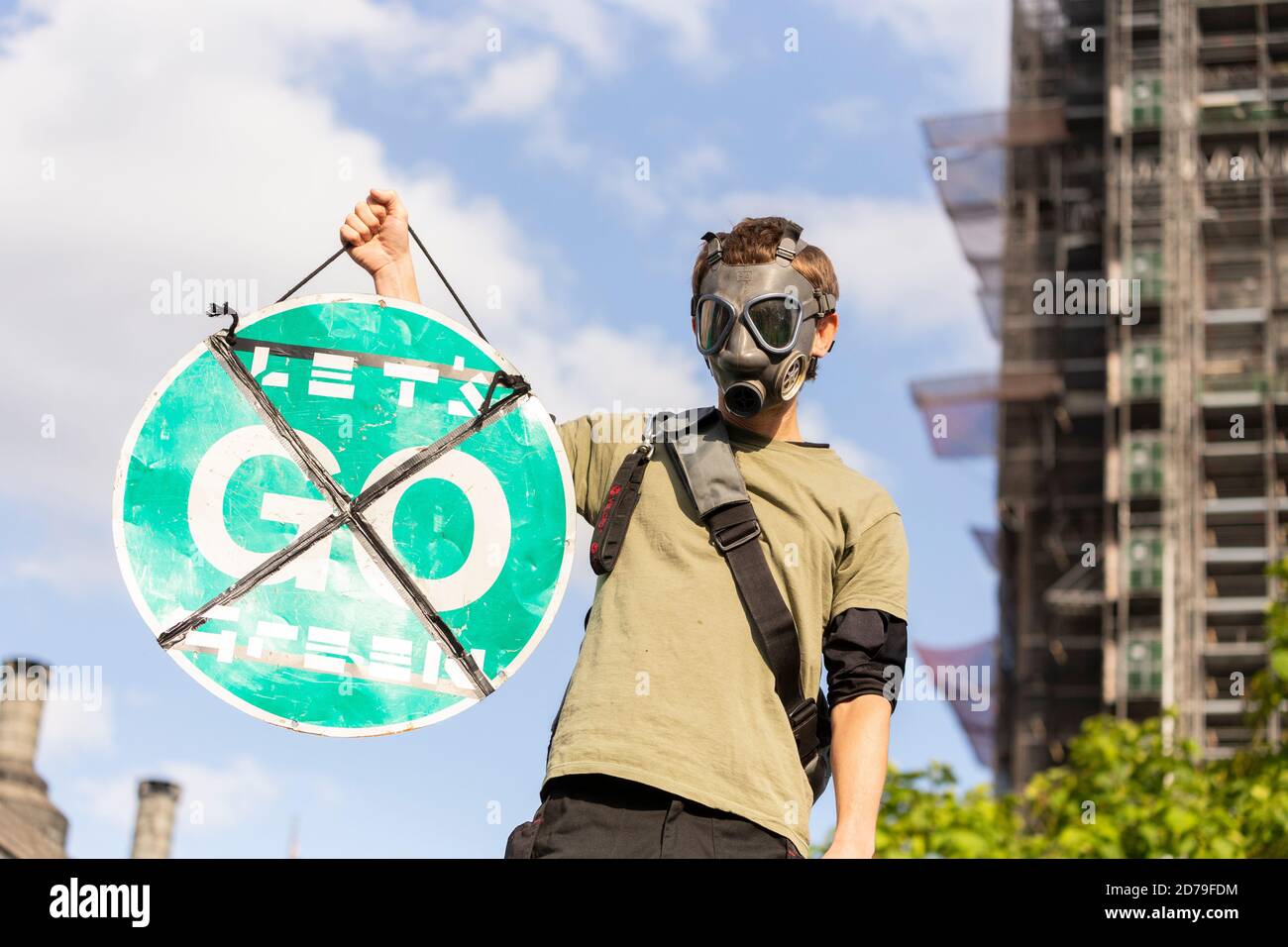 Man holding gas climate change sign hi-res stock photography and images ...