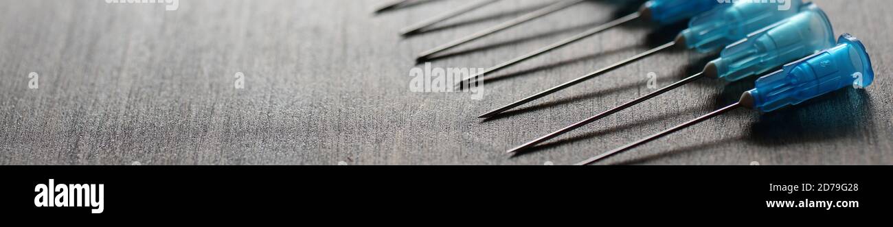 Background with ampoule and needles from a medical syringe Stock Photo ...