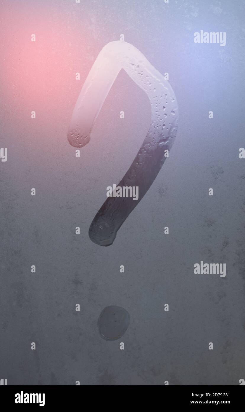 Inscription question mark on the sweaty glass. question mark drawn on a ...