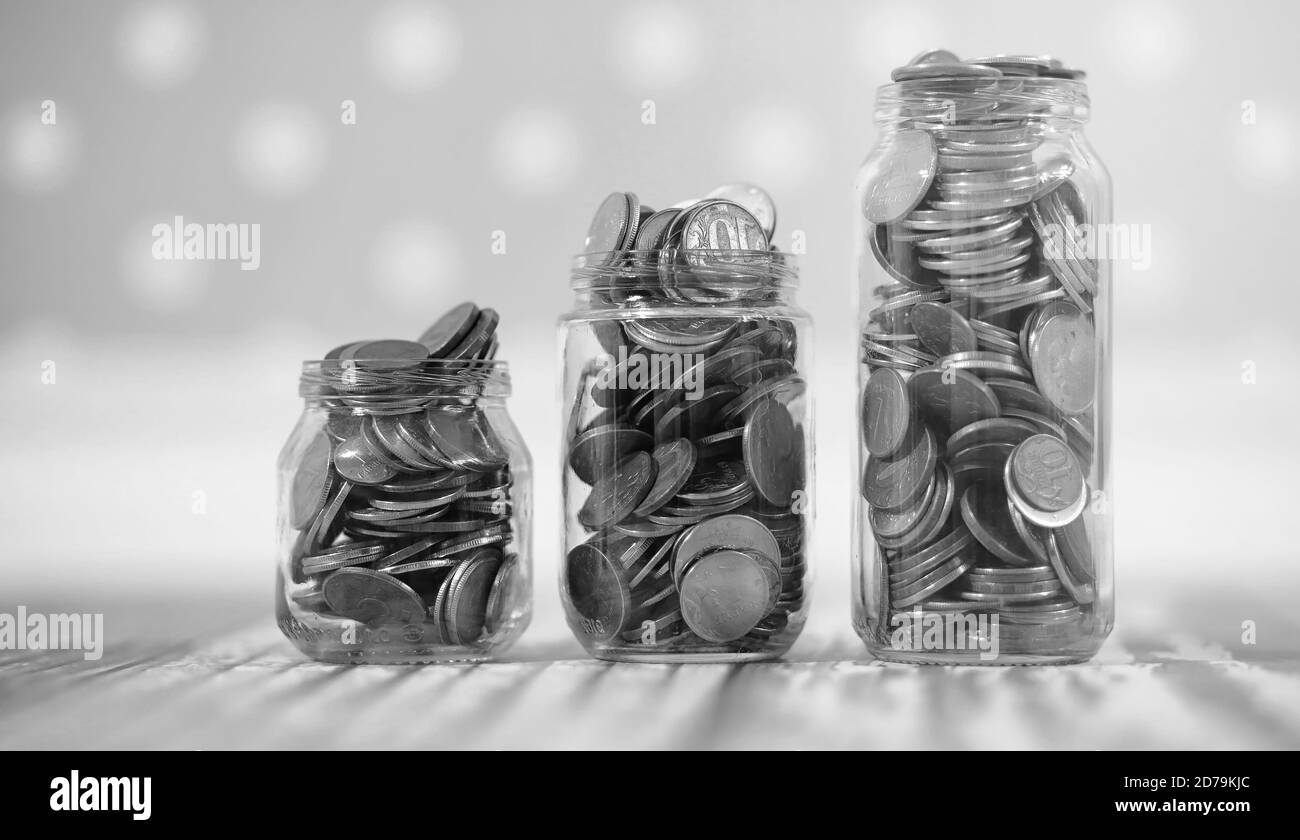 Open jar money savings Black and White Stock Photos & Images - Alamy