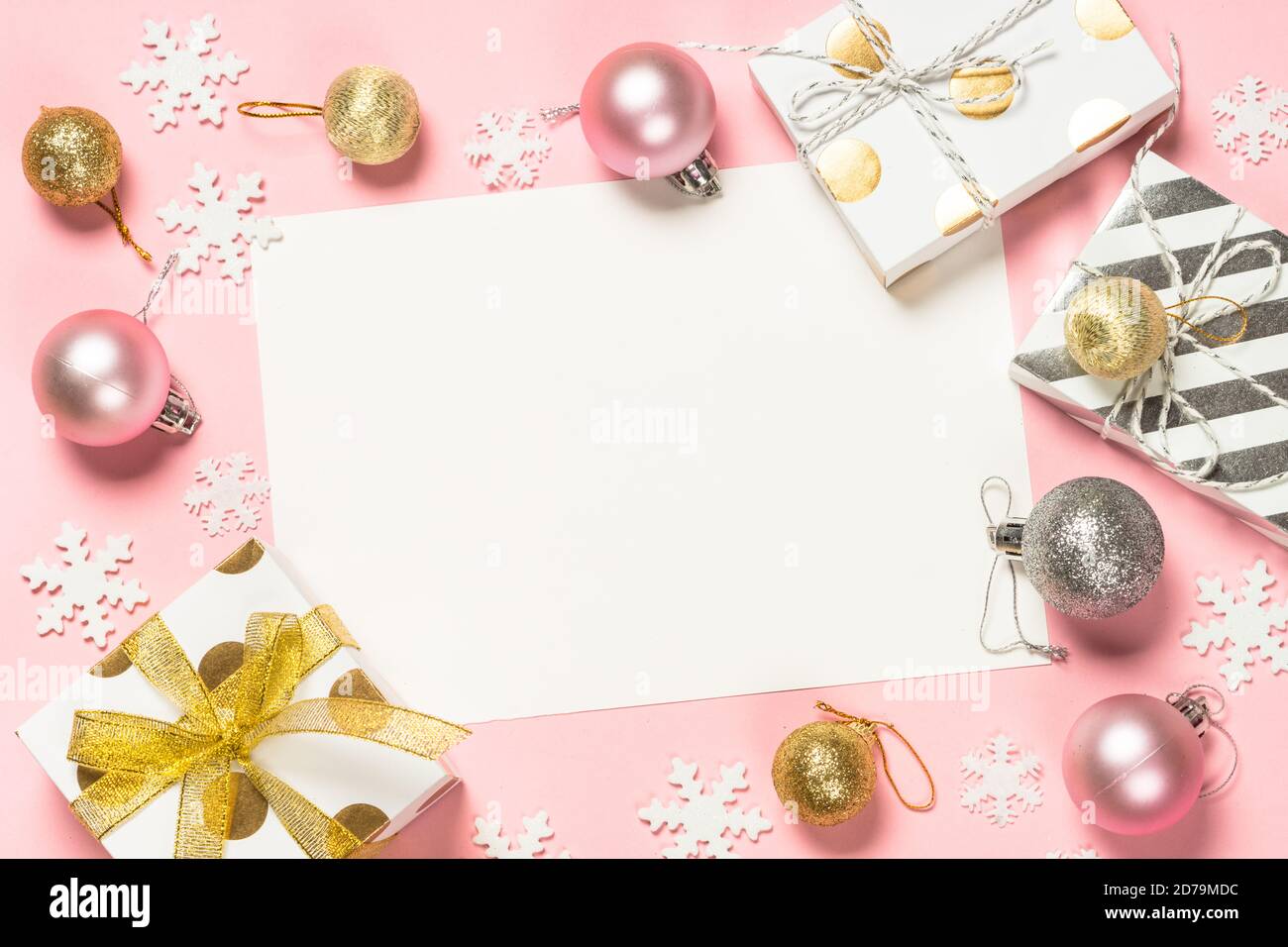 Christmas pink flat lay background with present box and decorations ...