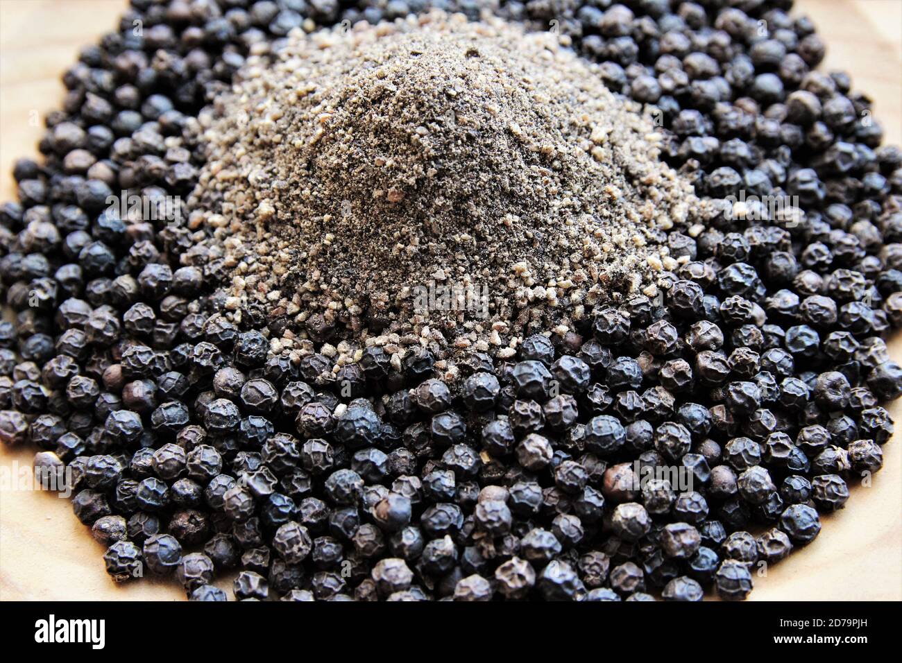 Black peppercorn and powder stock photo Stock Photo - Alamy