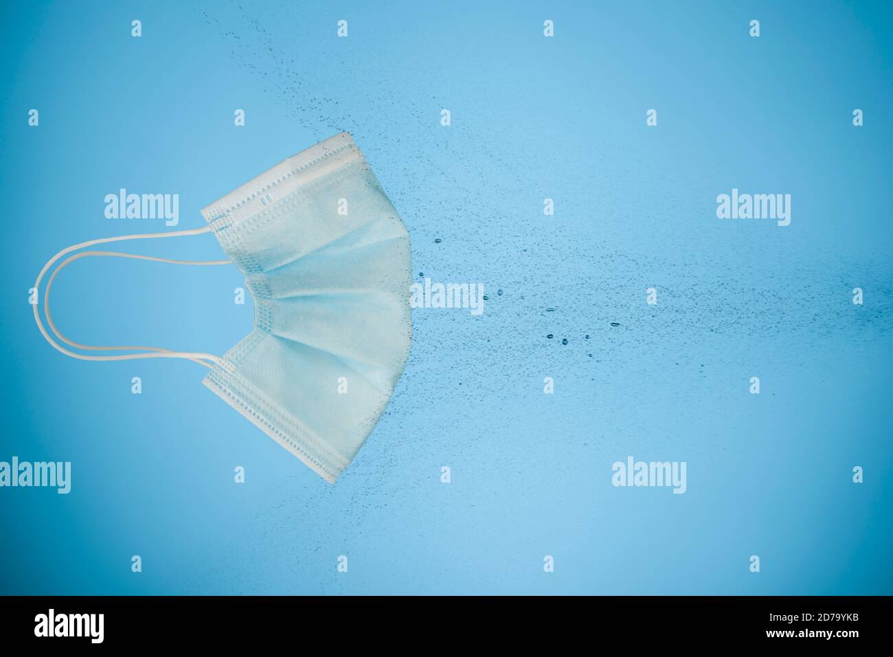 Surgical mask as protection against spray of breath particles Stock ...