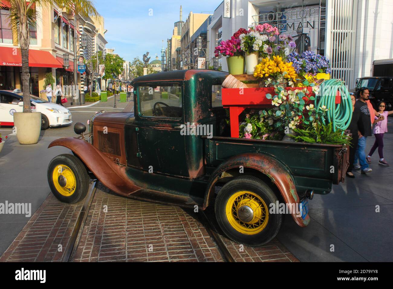 Vintage truck carrying load of flowers in Original Farmers Market Los ...