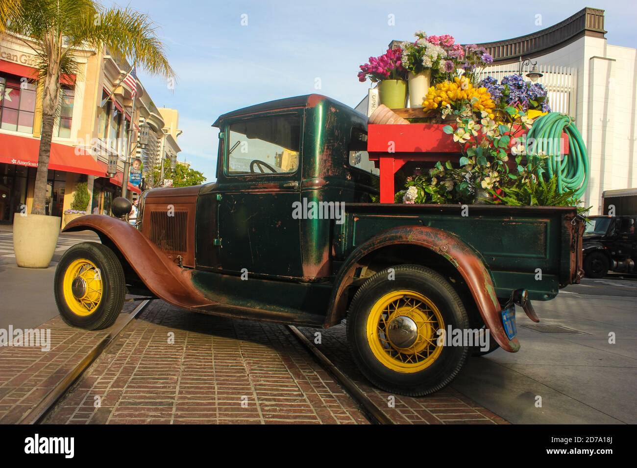 Vintage truck carrying load of flowers in Original Farmers Market Los ...