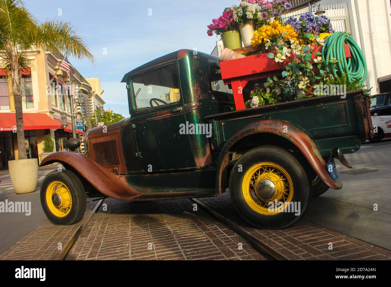 Vintage truck carrying load of flowers in Original Farmers Market Los ...