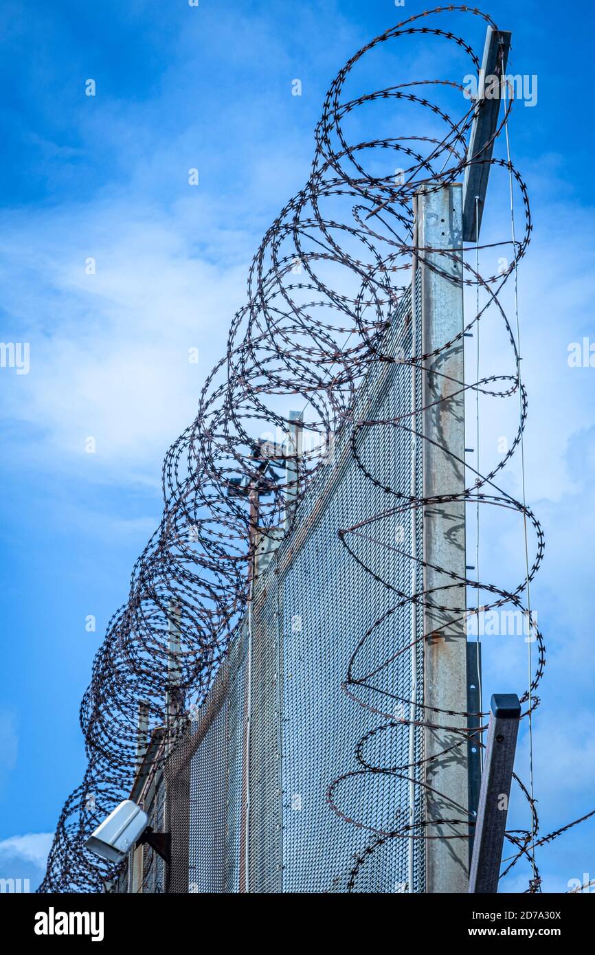 Coil of razor wire hi-res stock photography and images - Alamy