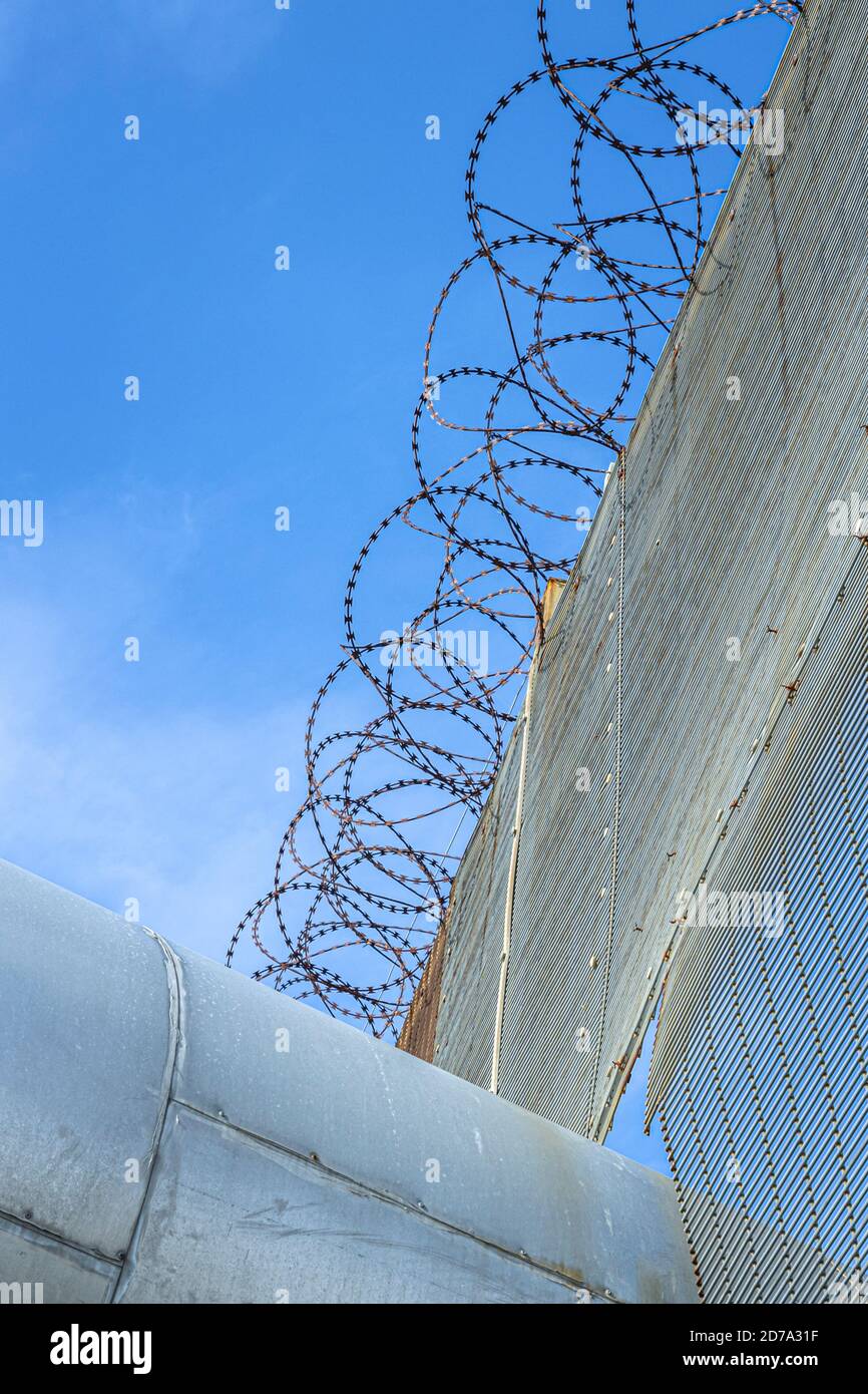 Coil of razor wire hi-res stock photography and images - Alamy