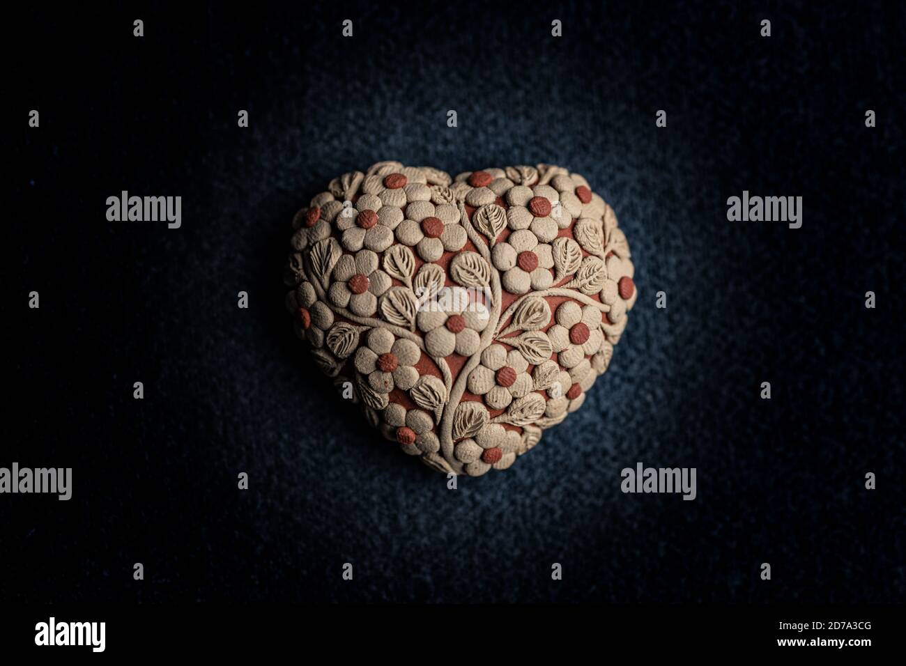 Clay heart with relief from the state of Oaxaca Stock Photo - Alamy