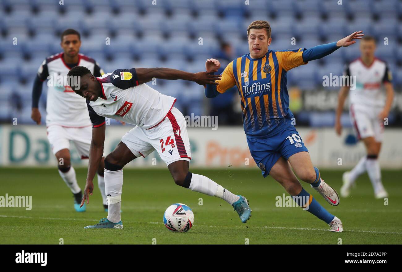 Bolton Wanderers' Arthur Gnahoua (left) and Shrewsbury Town's Josh Vela ...
