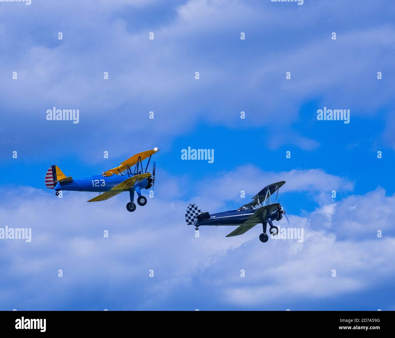 Two Antique Biplanes Flying Stock Photo - Alamy