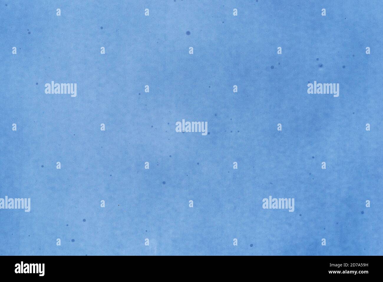Close view of the surface of an old shipping container with fading ...