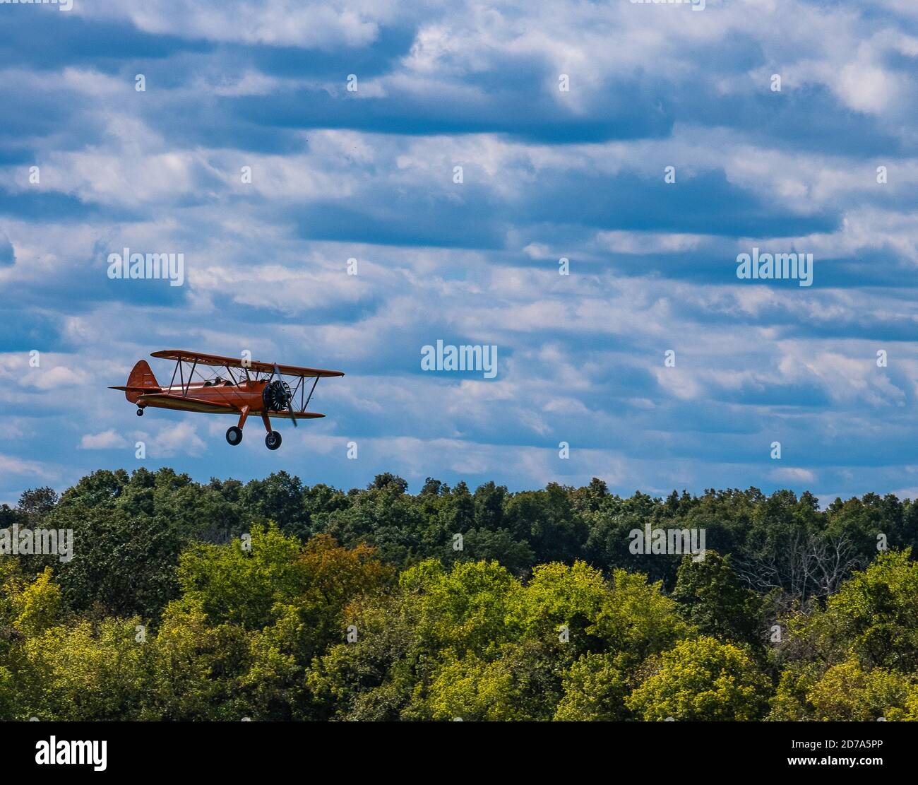 Red Biplane Landing Stock Photo - Alamy