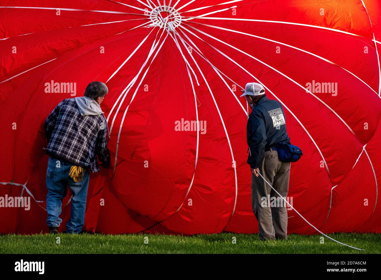 Inflating Red Hot Air Balloon Stock Photo - Alamy