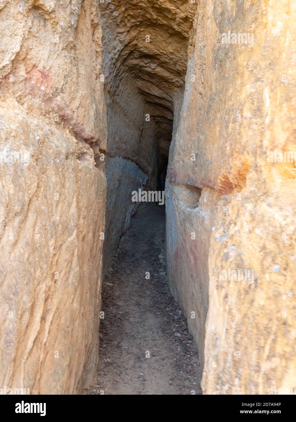 Shot of an old cave tunnel Stock Photo - Alamy