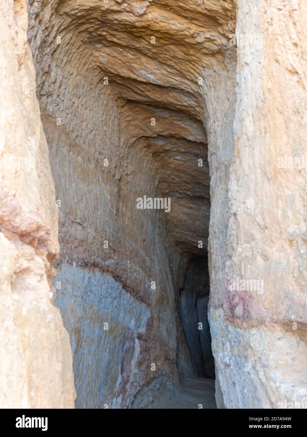 Shot of an old cave tunnel Stock Photo - Alamy