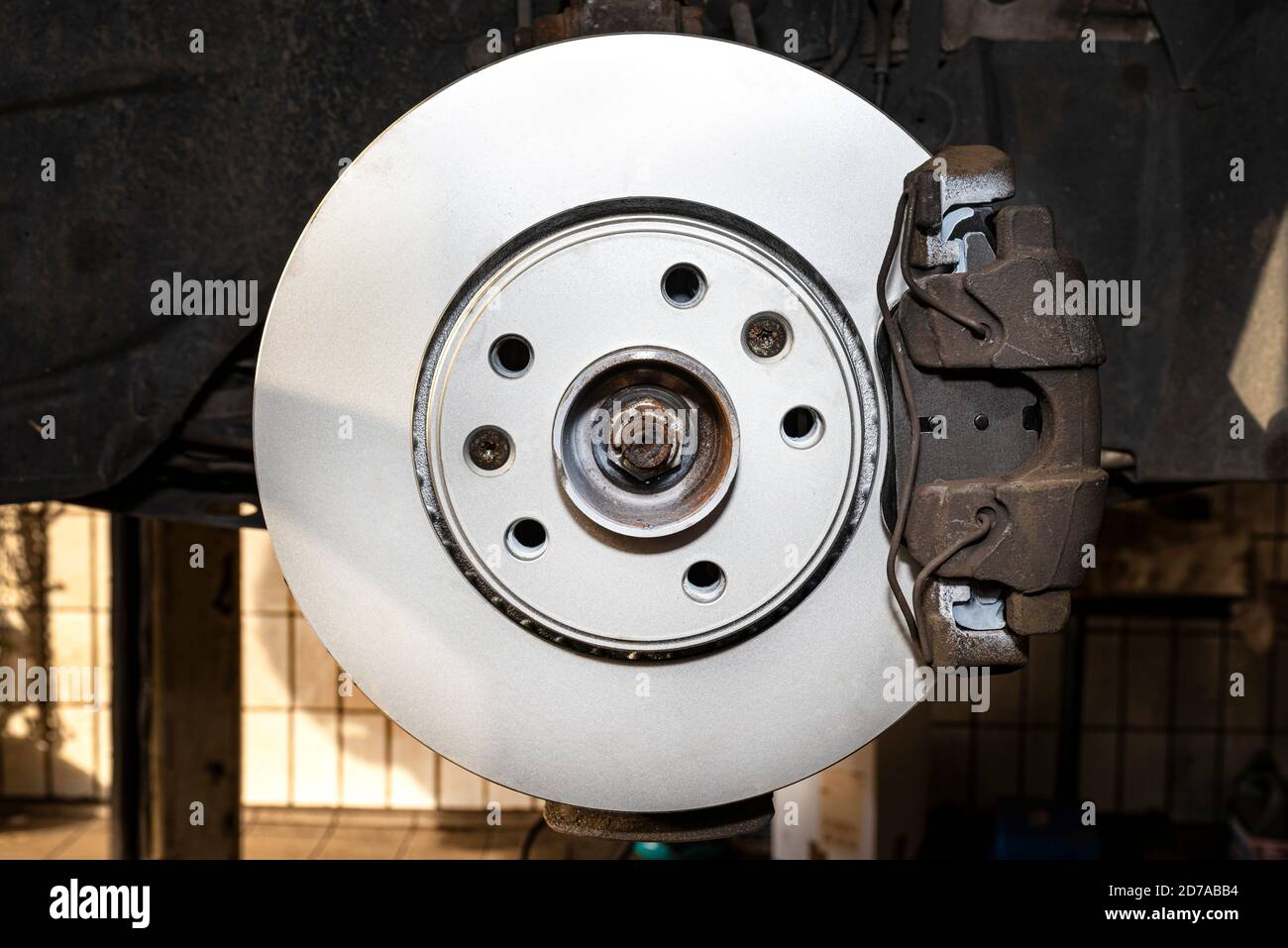 New brake disc with an anti-corrosion layer, mounted on the front hub ...