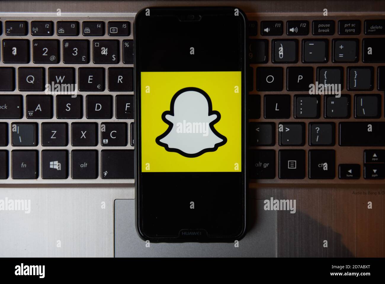 In this photo illustration a Snapchat logo seen displayed on a ...