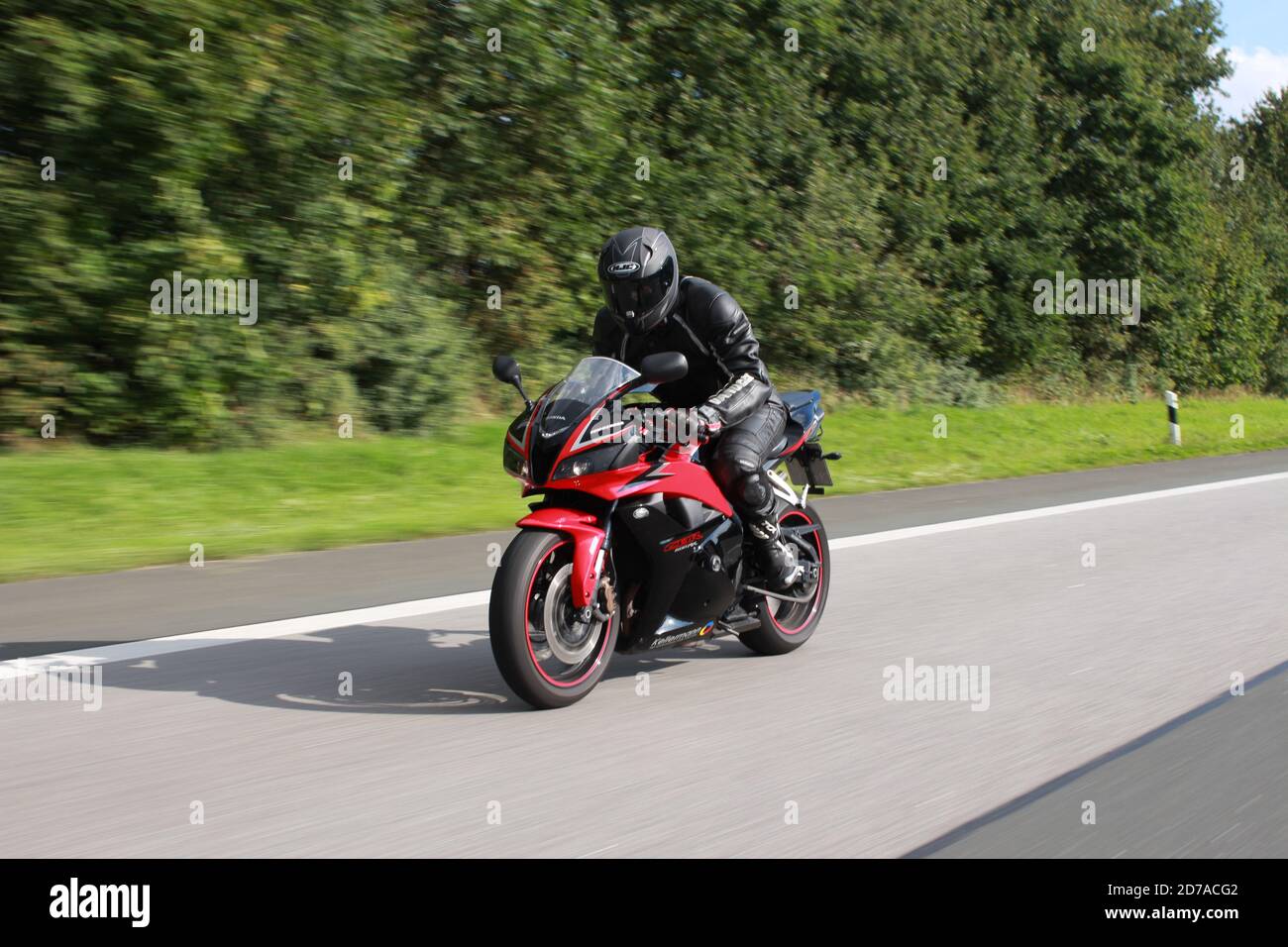 motorcycle riding on German autobahn Stock Photo - Alamy