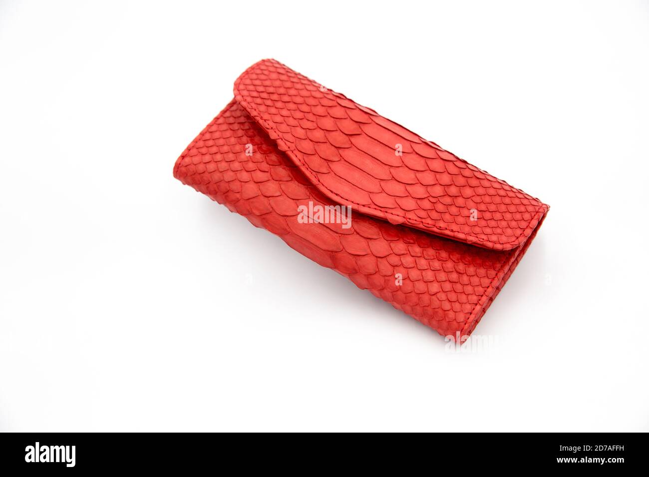 Trendy natural red snake python skin woman wallet on white isolated ...