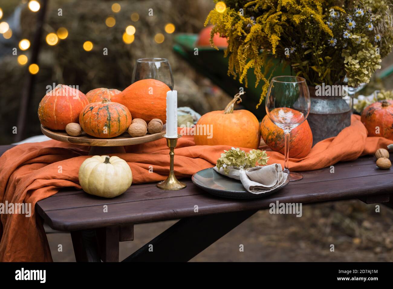 Fall themed holiday table setting arrangement for a seasonal party ...